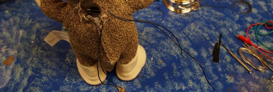 toy monkey switch adapted with wires – DIYAbility